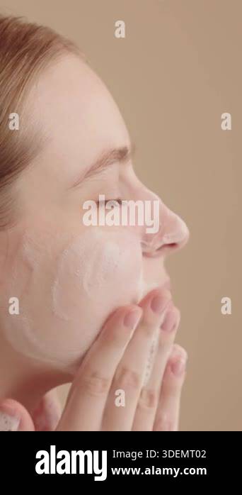 Young girl gently washing her face with cleansing foam, Daily skincare ...