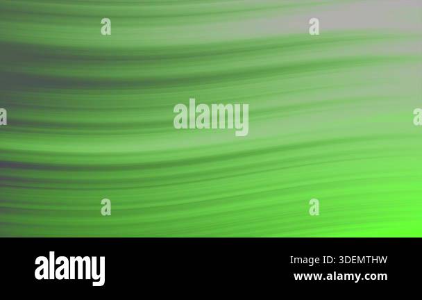 Dynamic abstract motion graphics featuring smooth flowing green waves ...