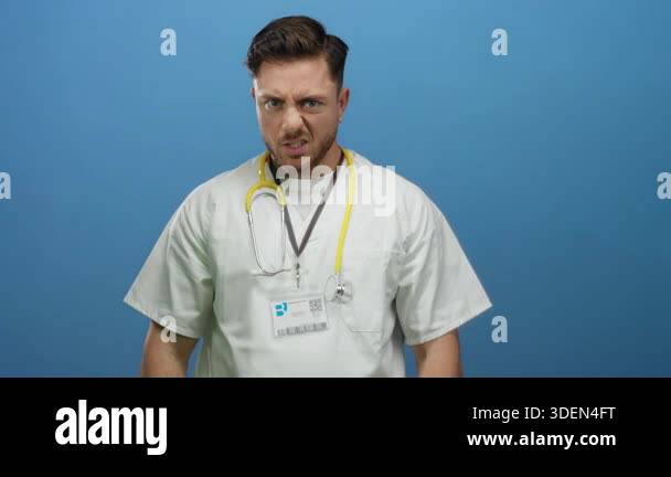 Young bearded doctor posing with a stethoscope making a fighting ...