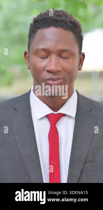 African Businessman Shaking Head in Acceptance Outdoor Stock Video ...