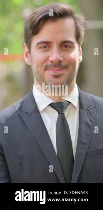 Portrait of Young Businessman inviting People Outdoor Stock Video ...