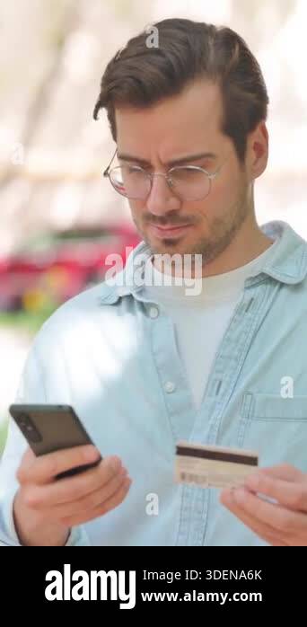 Portrait of Casual Young Man Upset with Online Banking Failure Outdoor ...