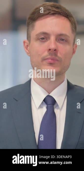 Vertical video, Portrait of Confident Businessman inviting People Stock ...