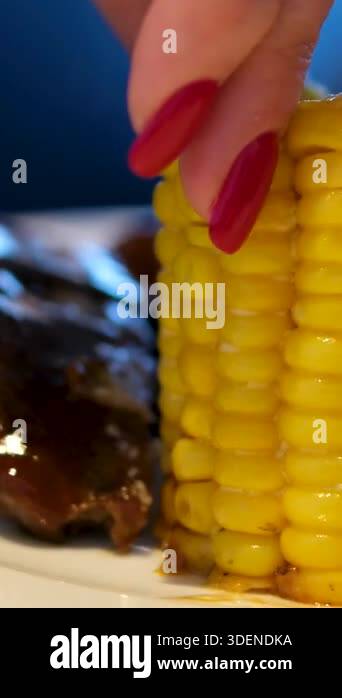 Ribs corn potatoes Cropped shot of unrecognizable male chef ...