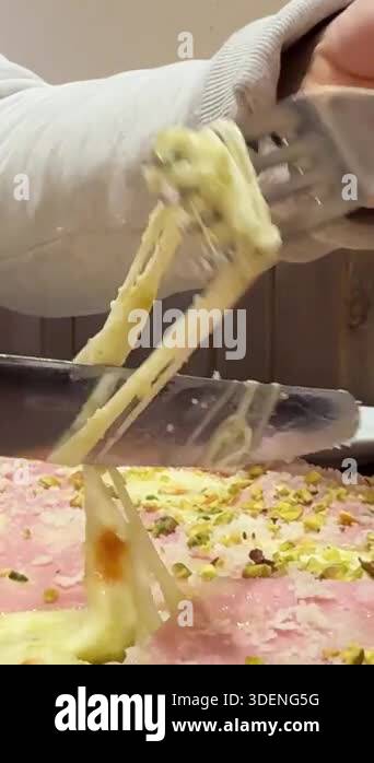 Appetizing Cheesy Italian Pizza with Ham, Cheese and Pistachios, Woman ...