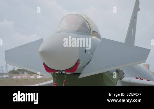 Military fighter jet on ground featuring bubble canopy open radar dome ...