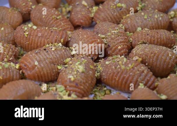 Lebanese recipe for Maakaroun fritters: fine wheat semolina, flour ...