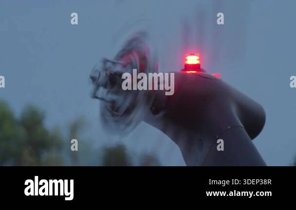 Helicopter tail rotor spinning with red warning light illuminated ...