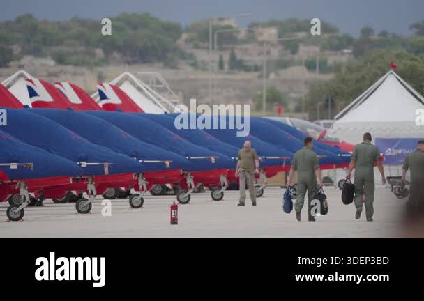 LUQA, MALTA - SEPTEMBER 28, 2025: A line of Red Arrows display aircraft ...