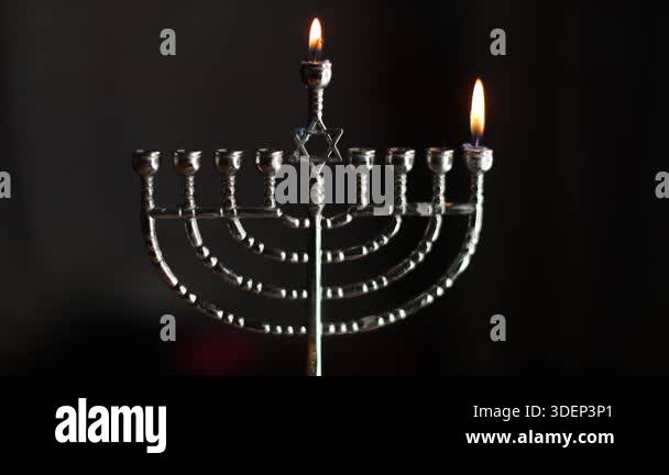 First Night of Hanukkah Menorah Close-Up: A Symbol of Light, Faith, and ...