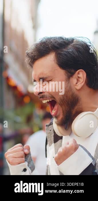 Indian young man screams yell shout from stress tension problems feels ...