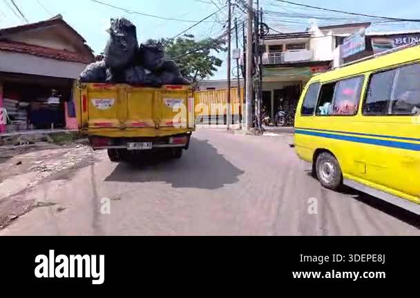 4K footage featuring the crowded city landscape during a clear day with ...