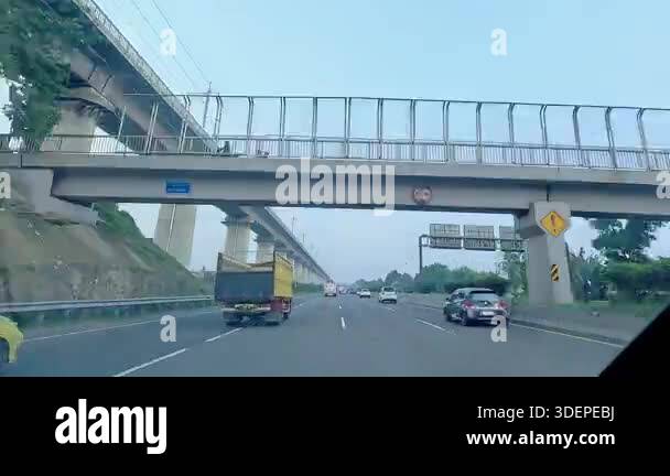 4K footage featuring the crowded city landscape during a clear day with ...