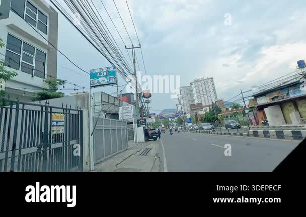 4K footage featuring the crowded city landscape during a clear day with ...