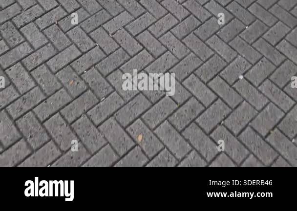 Top-down video features a close-up, moving shot of a herringbone ...