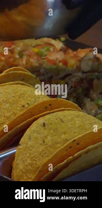 Vertical video. Fresh Hard-Shell Tacos Filled with Chicken, Cabbage ...