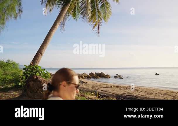 Woman in Sunglasses Drinking Champagne on Tropical Beach at Sunset ...