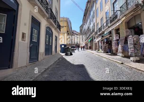 POV urban Portugal street Lisbon narrow alleyway walk travel Stock ...