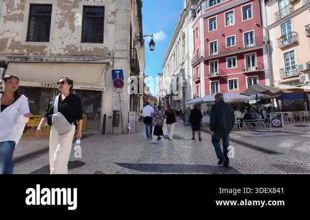 Narrow street Lisbon Portugal walk POV European architecture vibe Stock ...