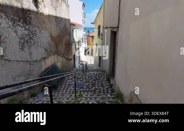 POV narrow street Lisbon walking tour city Europe destination Stock ...