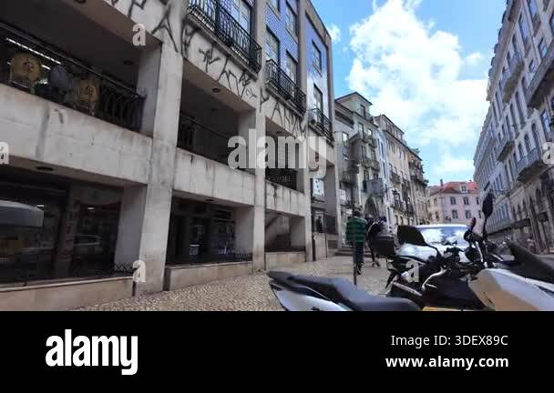 Portugal narrow alleyway walk Lisbon POV old town street scene Stock ...
