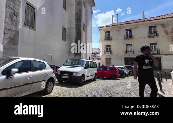 Walking narrow street in Lisbon POV city view Europe travel Stock Video ...