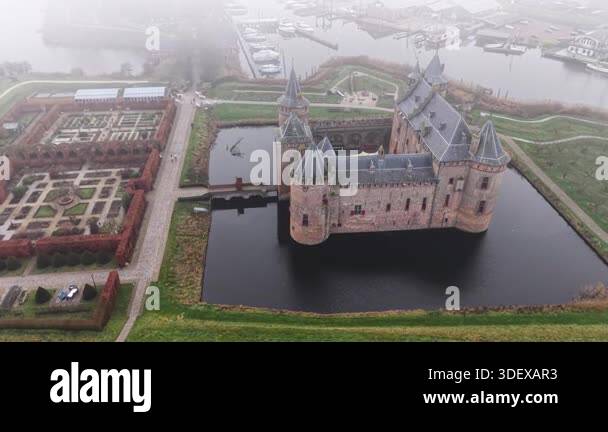 Aerial view of Muiderslot Castle moated medieval fortress with conical ...