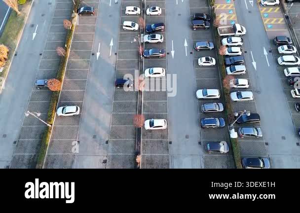 An overhead perspective captures a well-organized parking area at a ...