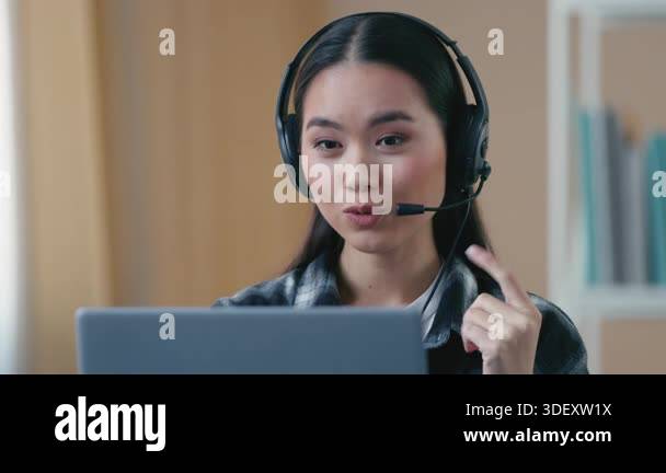Asian Korean business woman student headset headphones talking online ...