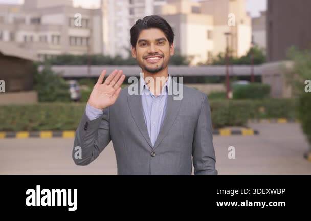 Indian Businessman Waving Hi, Hello Stock Video Footage - Alamy