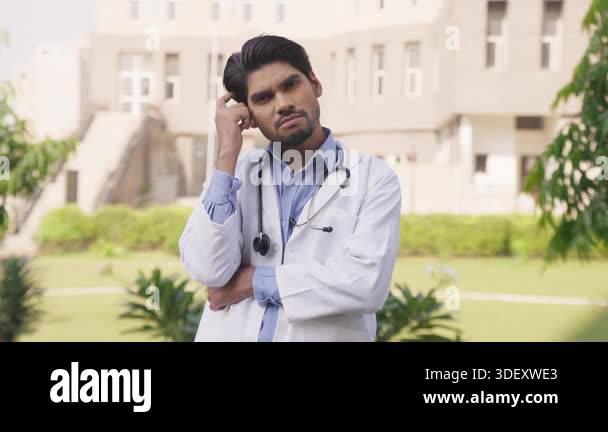 Confused Indian Doctor Looking in the Camera Stock Video Footage - Alamy