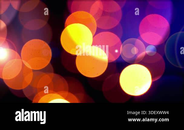 Vibrant colorful bokeh lights create a dynamic abstract background ...