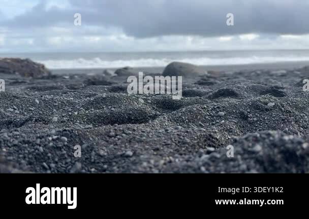 Remote Black Pebble Beach with Ocean Waves and Moody Icelandic Sky ...