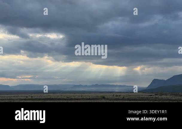 Dramatic Cloudy Sky over Remote Icelandic Plain with Distant Mountains ...