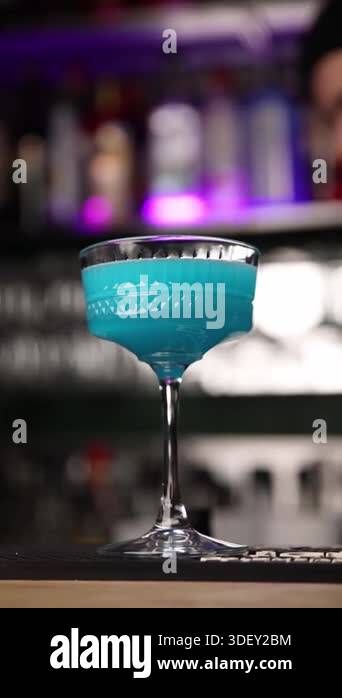 The bartender makes cocktails behind the bar counter Stock Video ...