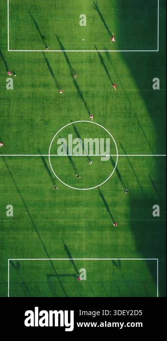 Soccer match on green field at sunset light . High quality 4k footage ...