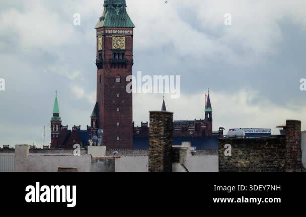 Copenhagen, Denmark - August 3, 2025: Copenhagen city hall clock tower ...