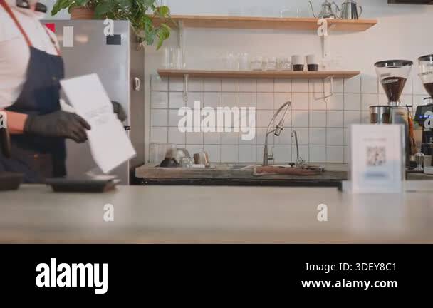 Asian cafe business owner put TAKE OUT ONLY sign on coffee bar counter ...