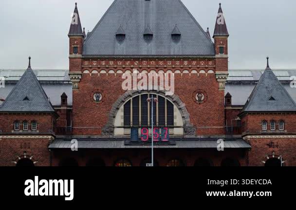 Historic red brick railway station building in Copenhagen city center ...