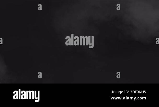 abstract white smoke fog slowly floating through space against black ...