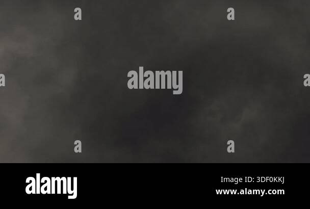 abstract white smoke fog slowly floating through space against black ...