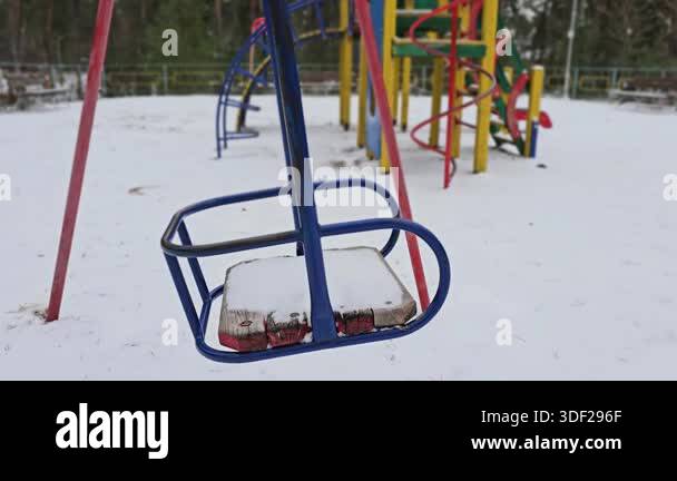 Empty kids playground in park with deep snow in winter in Ukraine Stock ...