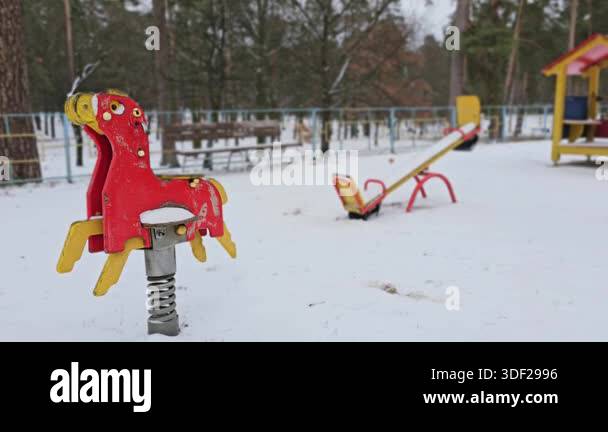 Empty kids playground in park with deep snow in winter in Ukraine Stock ...