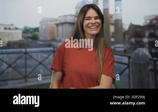 Young woman smiling in front of roman ruins, symbolizing vibrant ...
