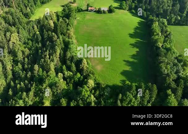 Drone view Drava riverside hills in summer, Gortina village, deep green ...