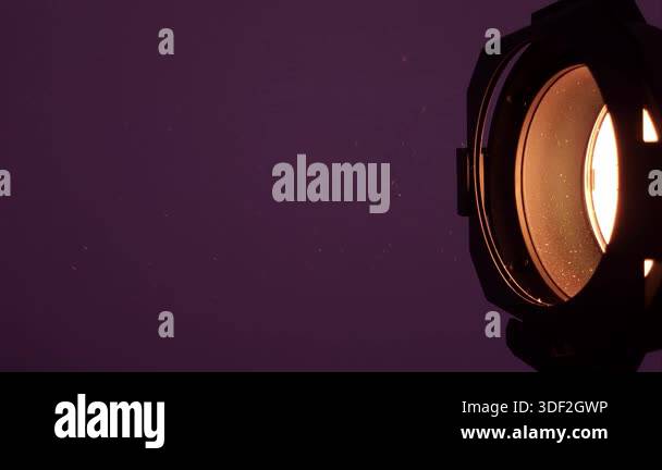 Professional studio spotlight glowing with dust particles in air Stock ...