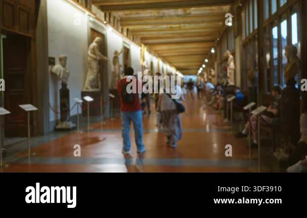 Museum corridor with soft blurred bokeh focus and defocused sculptures ...