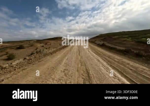 Off-road driving in 4WD vehicles on dirt roads among mountains and ...