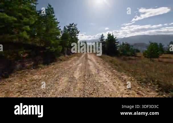 Off-road driving in 4WD vehicles on dirt roads among mountains and ...