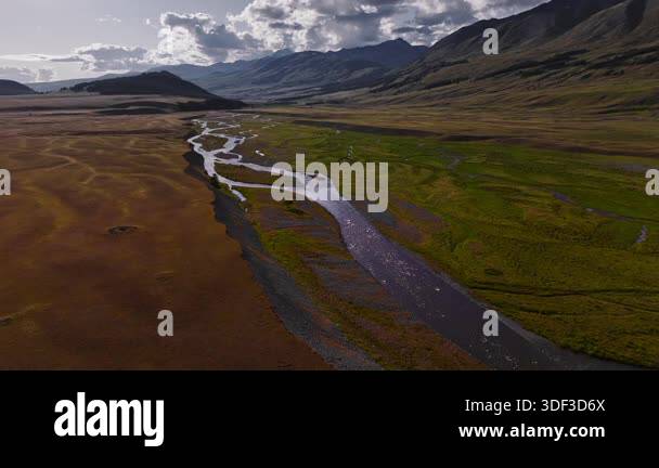 Meanders. Multiple spills of a mountain river stream in a steppe ...